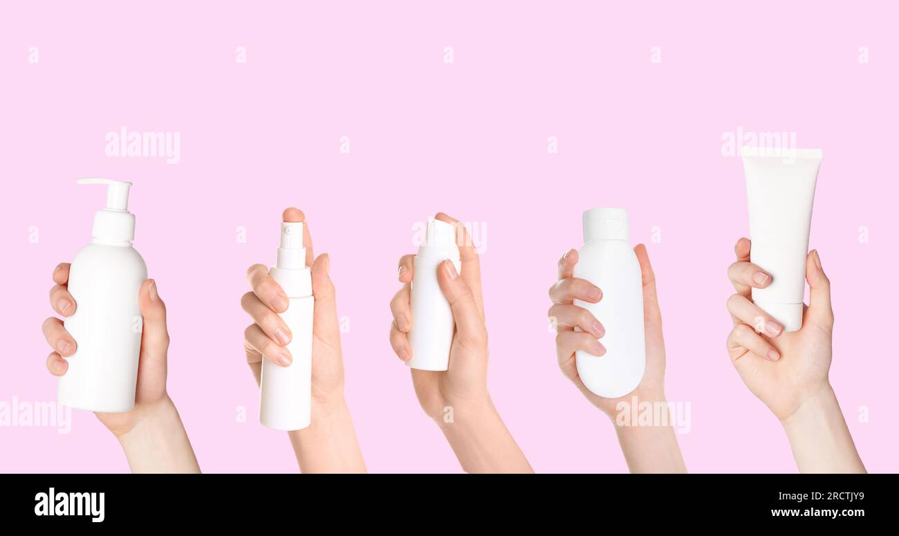 Face and body wash. Women holding bottles and tube of different ...