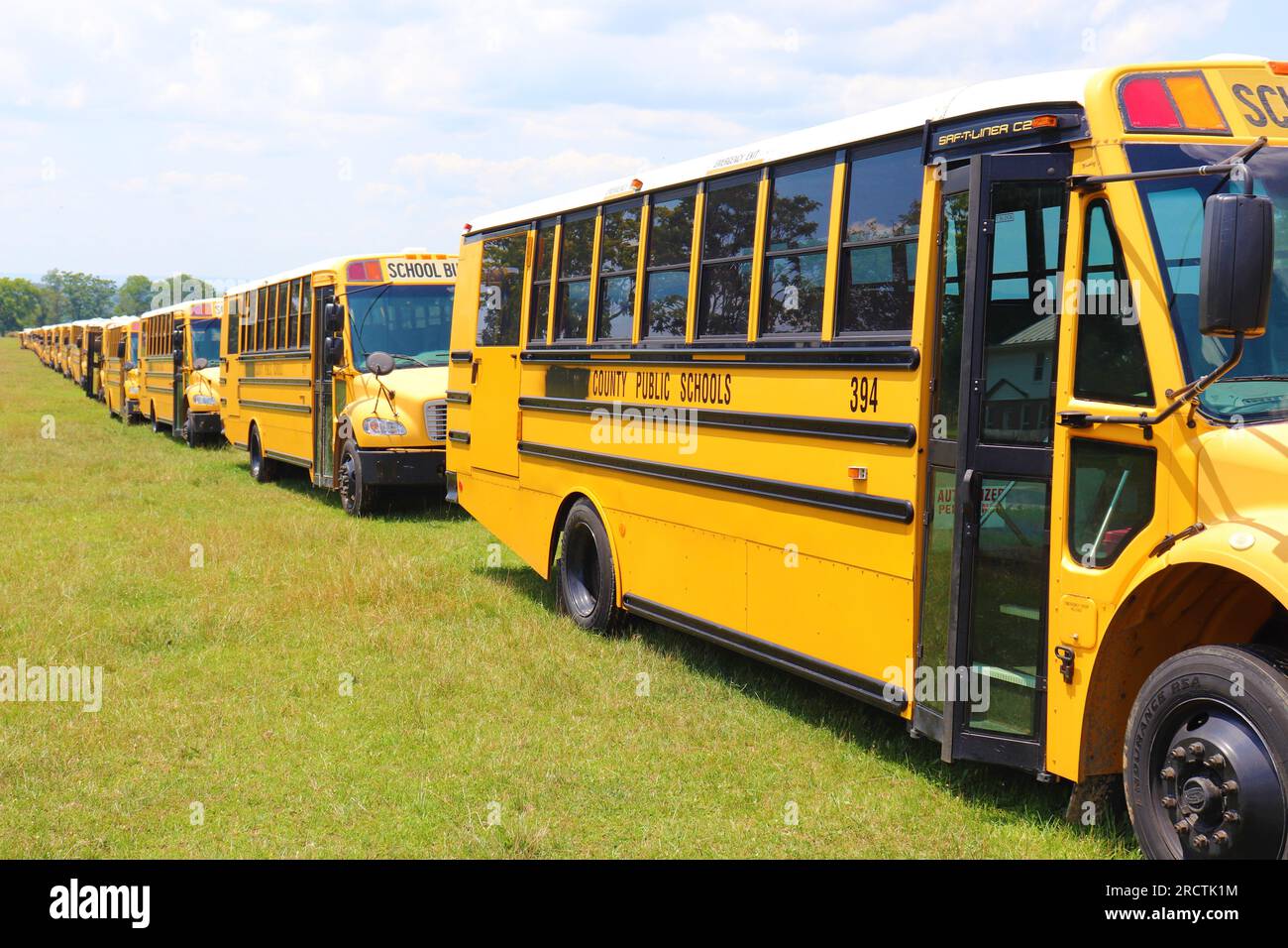 school buses line traffic Stock Photo - Alamy