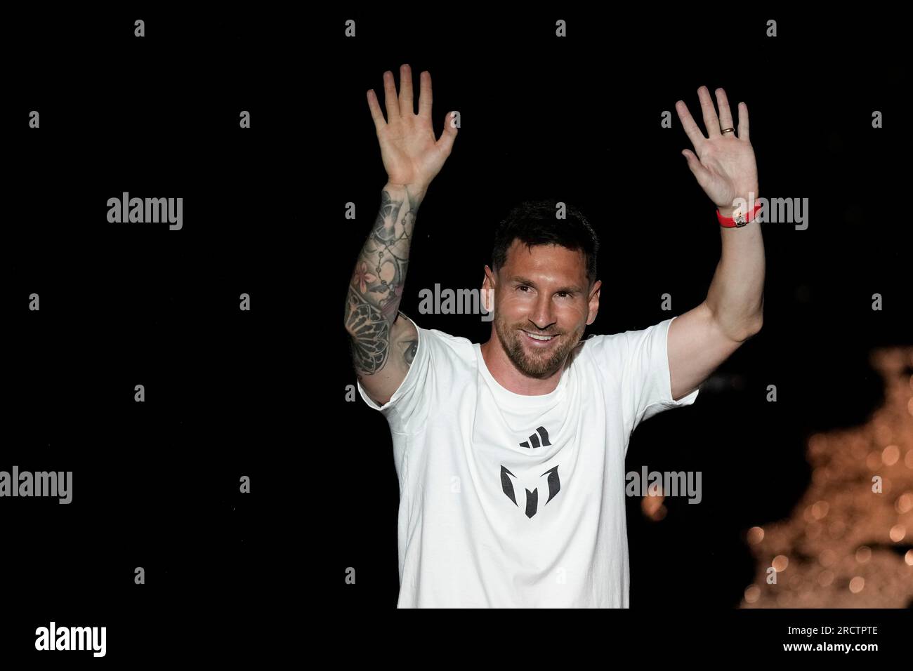 Inter Miami's Lionel Messi waves to fans as he is introduced during a ...