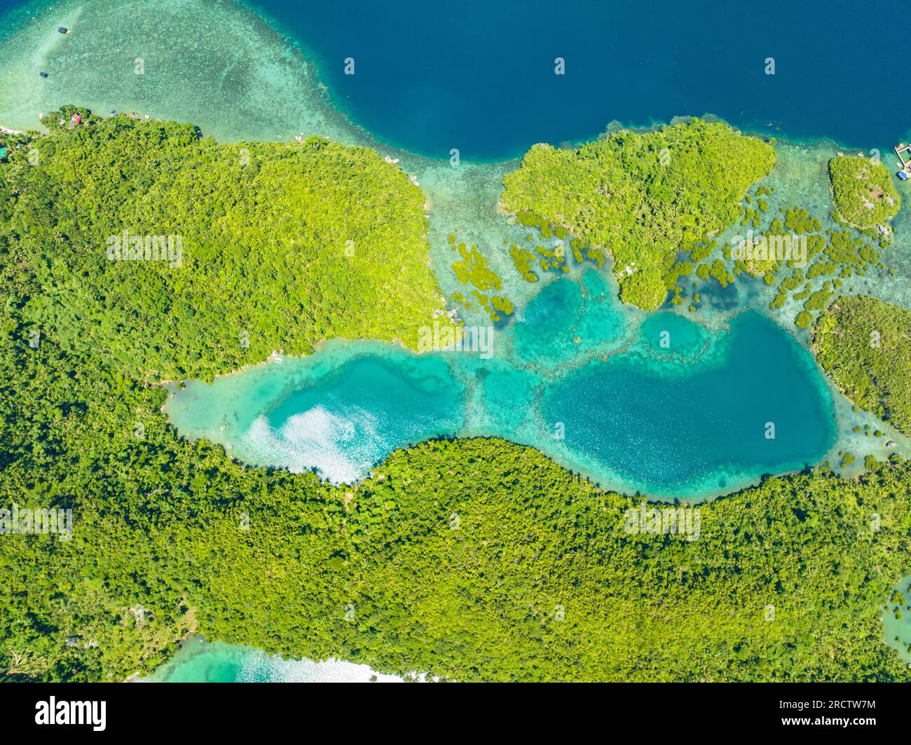 Beautiful beach in coast of lagoon. Aerial view of Tinago Island ...
