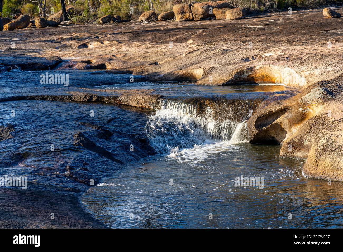 Sunset colours reflected onto waters of Bald Rock Creek, The Junction ...