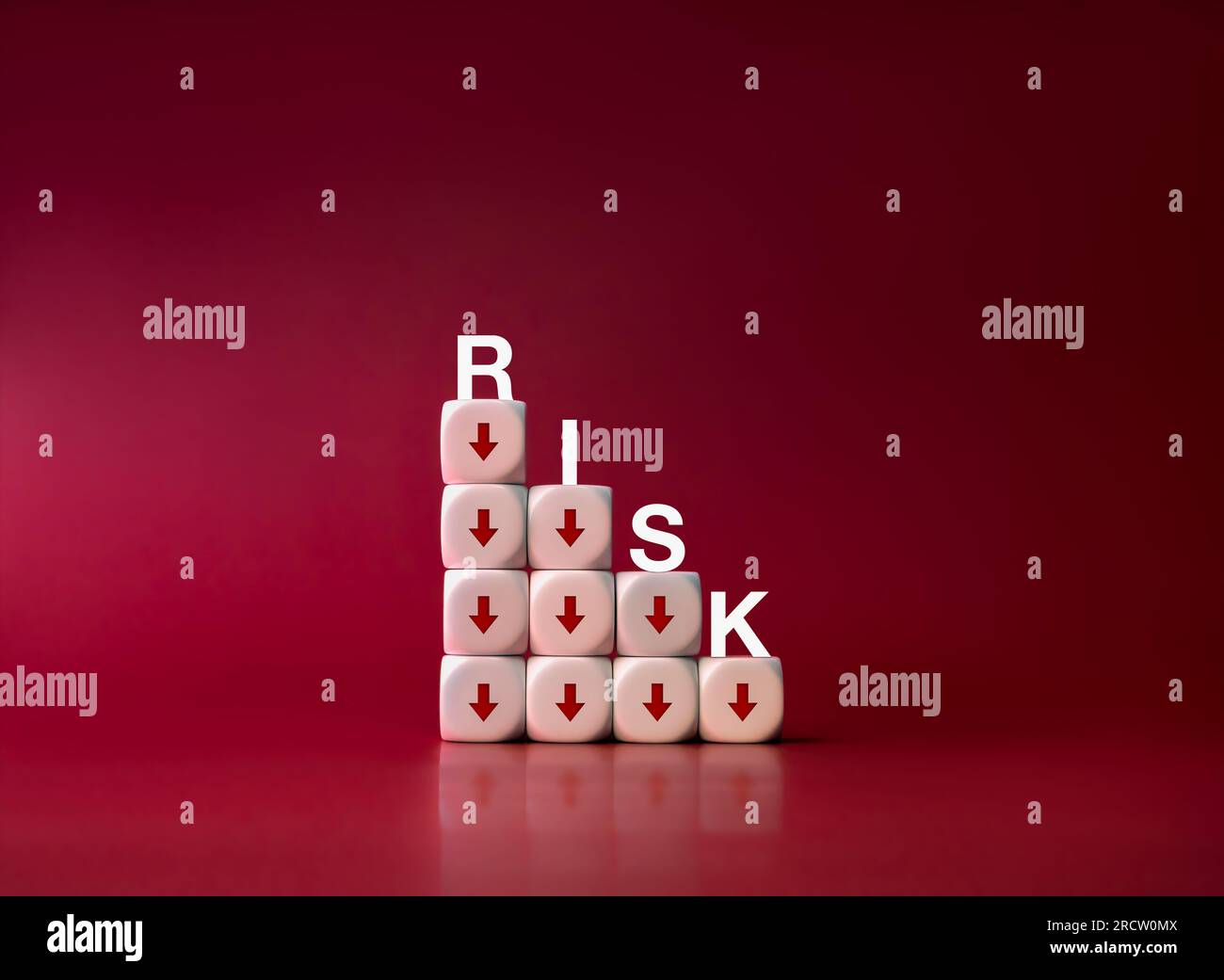 Word "RISK" on decrease business graph step, finance diagram with down arrows on white blocks on ...