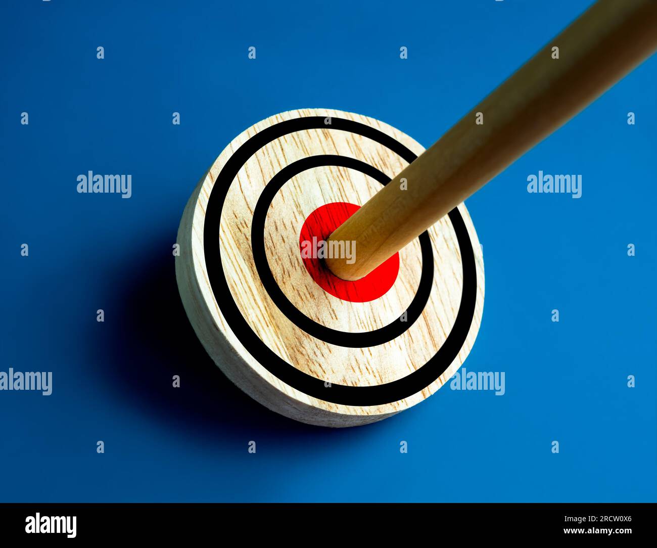 Big target and business goal concepts. Round target dart icon on wooden ...