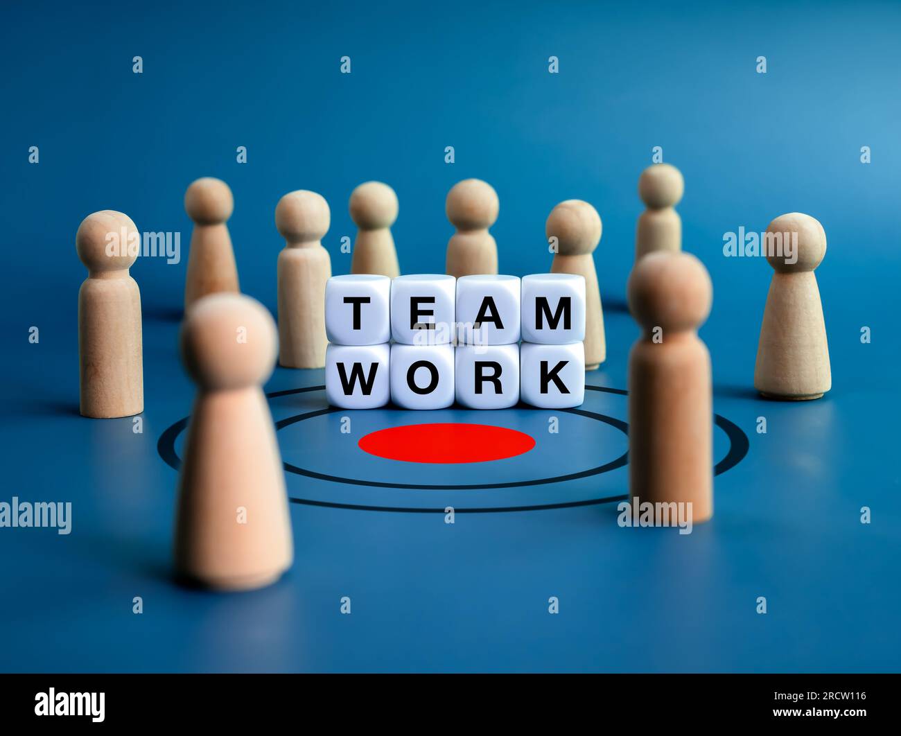 Team, teamwork, leadership and family business concepts. Words "TEAMWORK", text on white cube ...