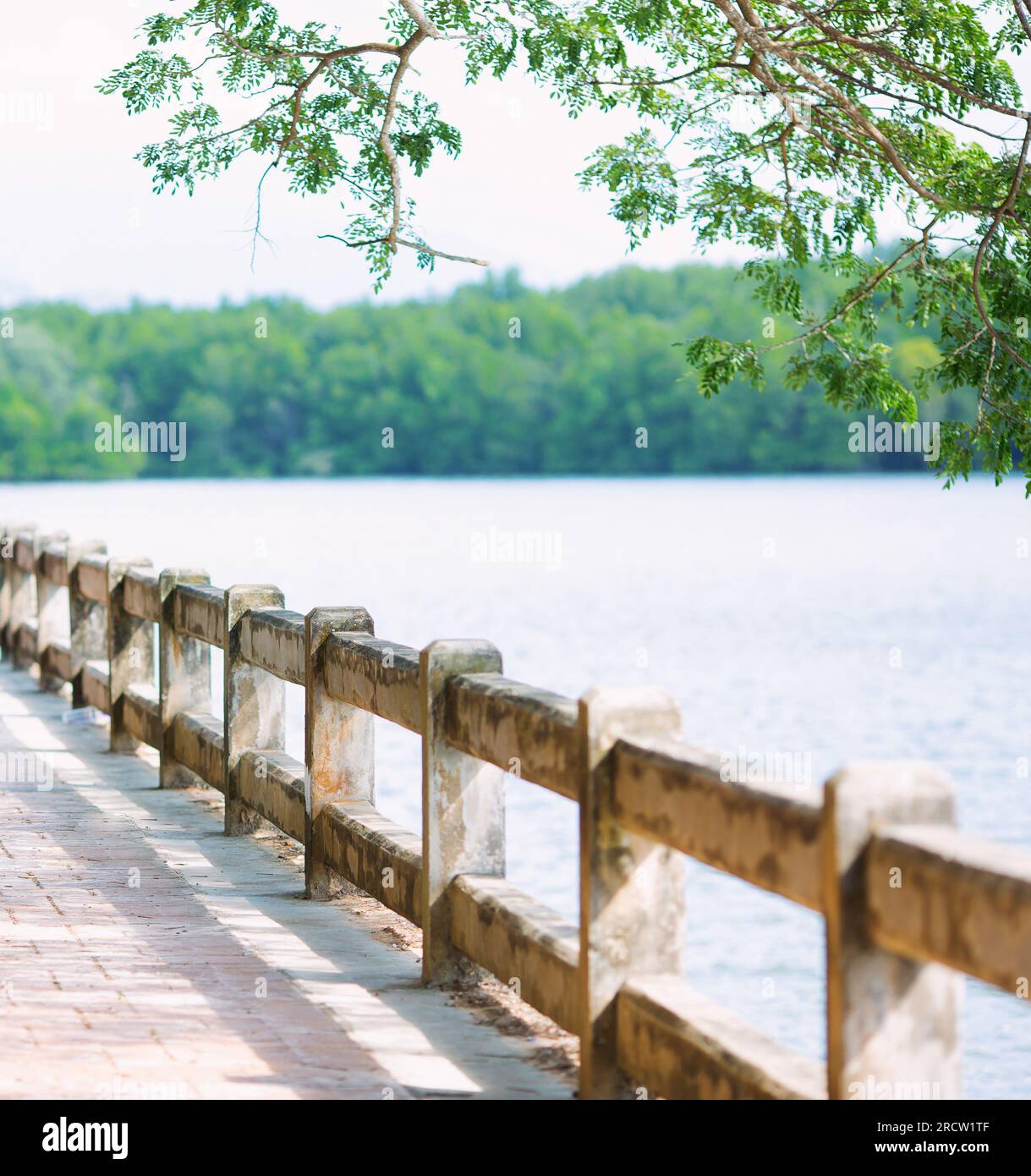 Leakage line blocking a long river walkway Stock Photo - Alamy