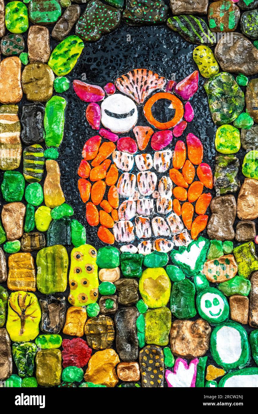 painted rock mosaic with an owl Stock Photo - Alamy