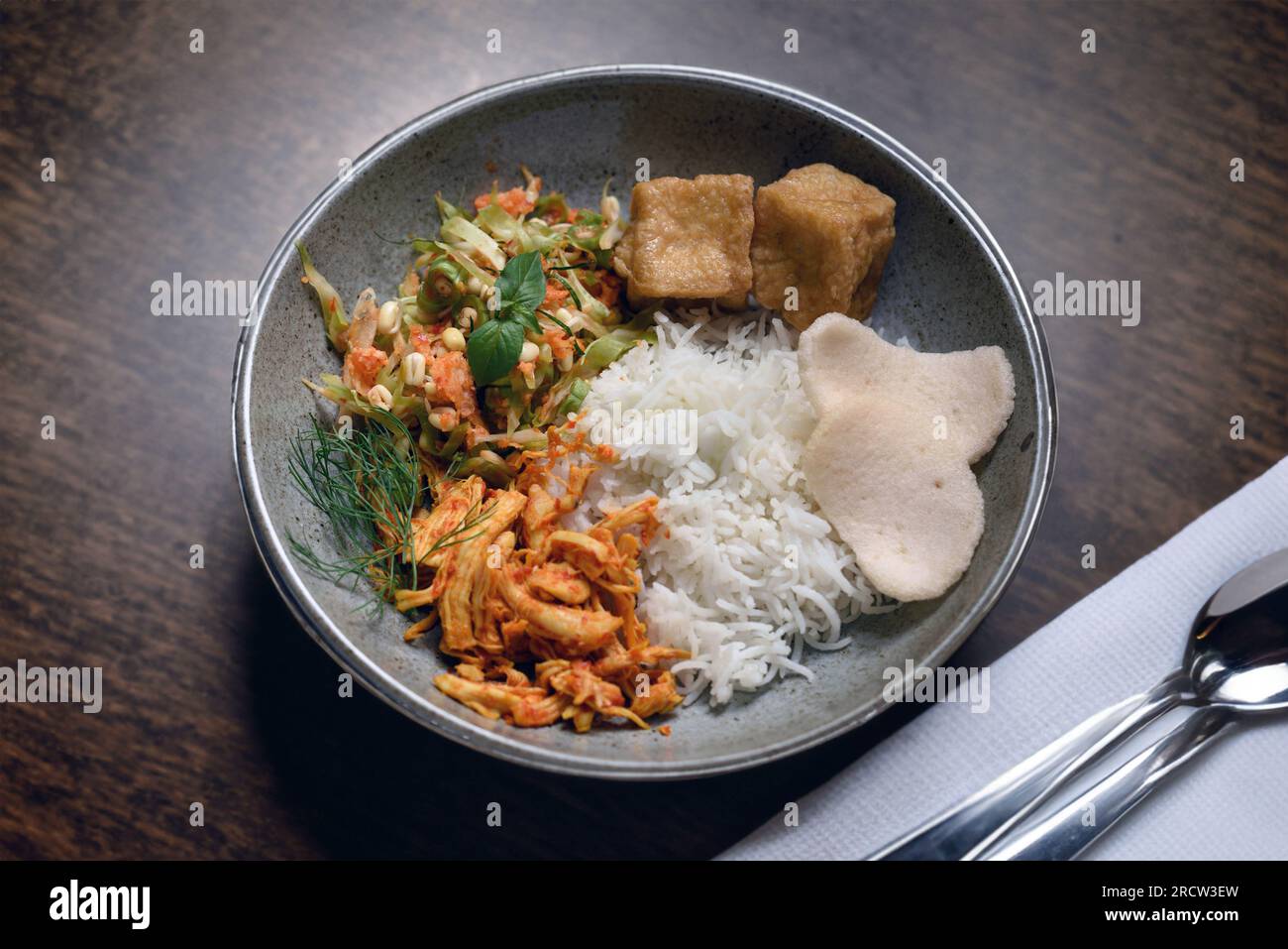 A delicious Nasi Campur, Indonesian food, street food Stock Photo - Alamy