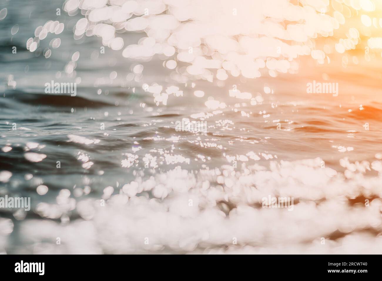 Abstract sea summer ocean sunset nature background. Small waves on ...