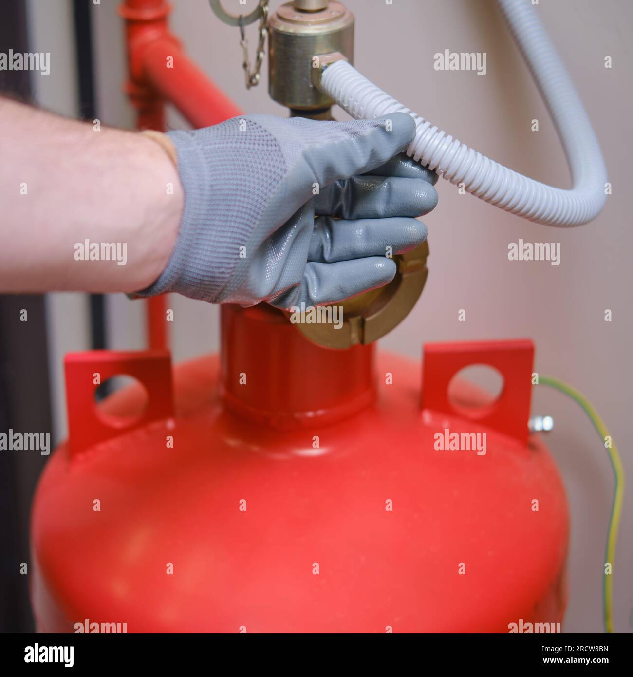 The inspector is inspecting the automatic equipment for fire prevention ...