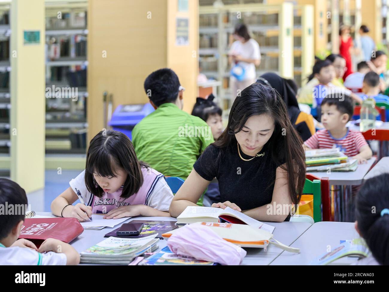 Students read books during summer vacation at Shaanxi Library in Xi'an ...