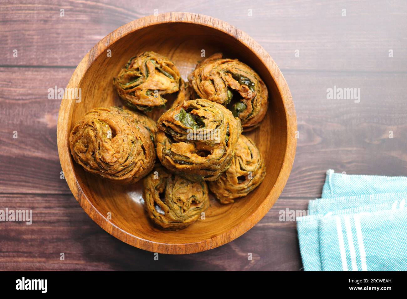 Dry Patra is an Indian dish made with colocasia leaves that are coated ...
