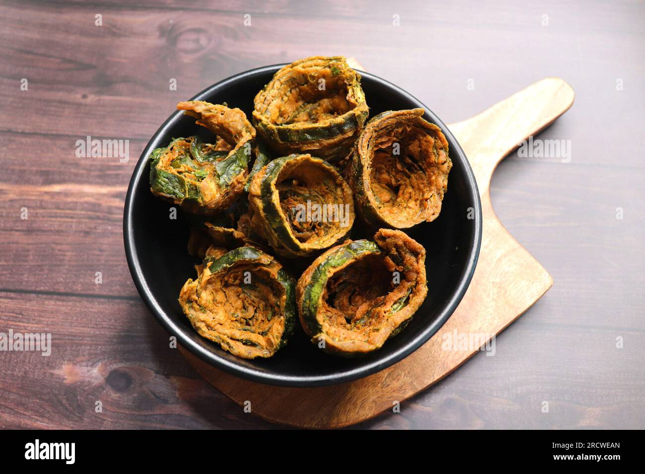 Dry Patra is an Indian dish made with colocasia leaves that are coated ...