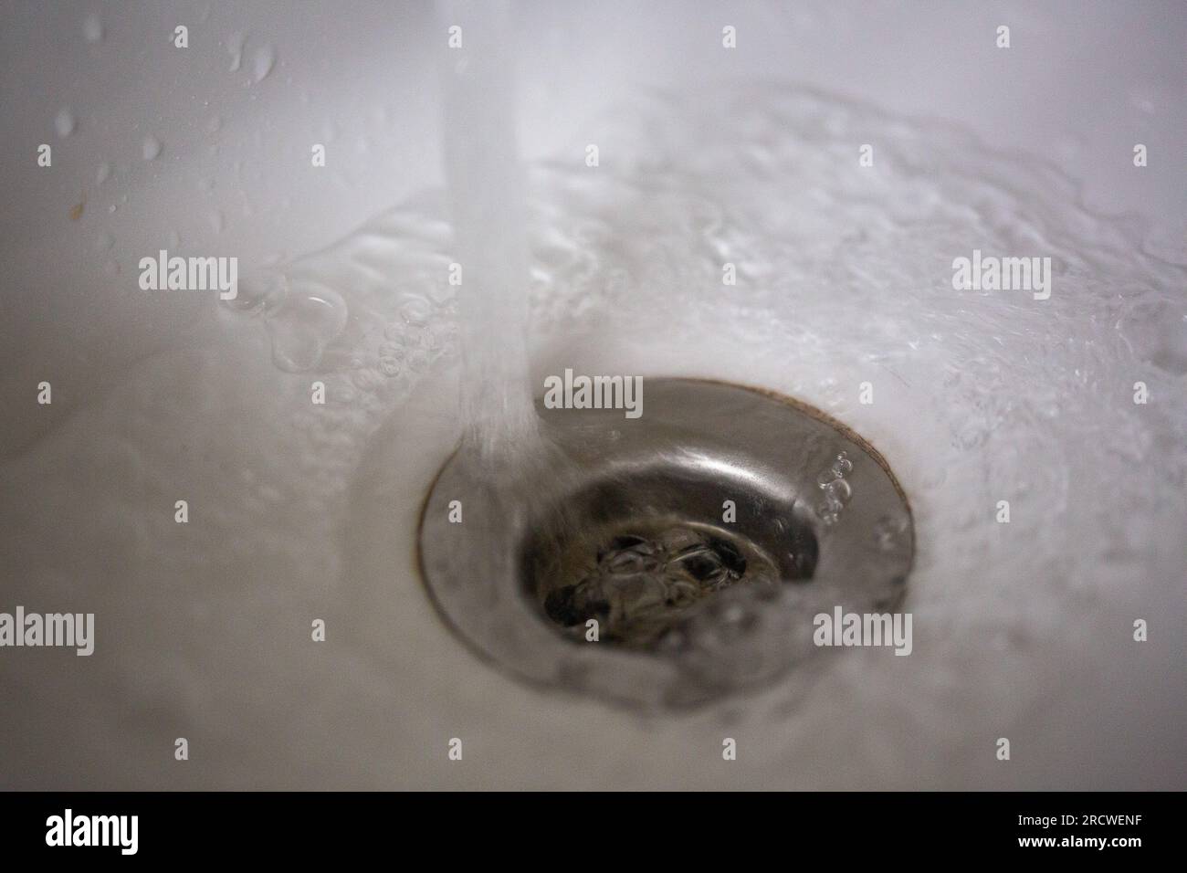 Berlin, Germany. 01st July, 2023. Tap water flows with pressure from ...