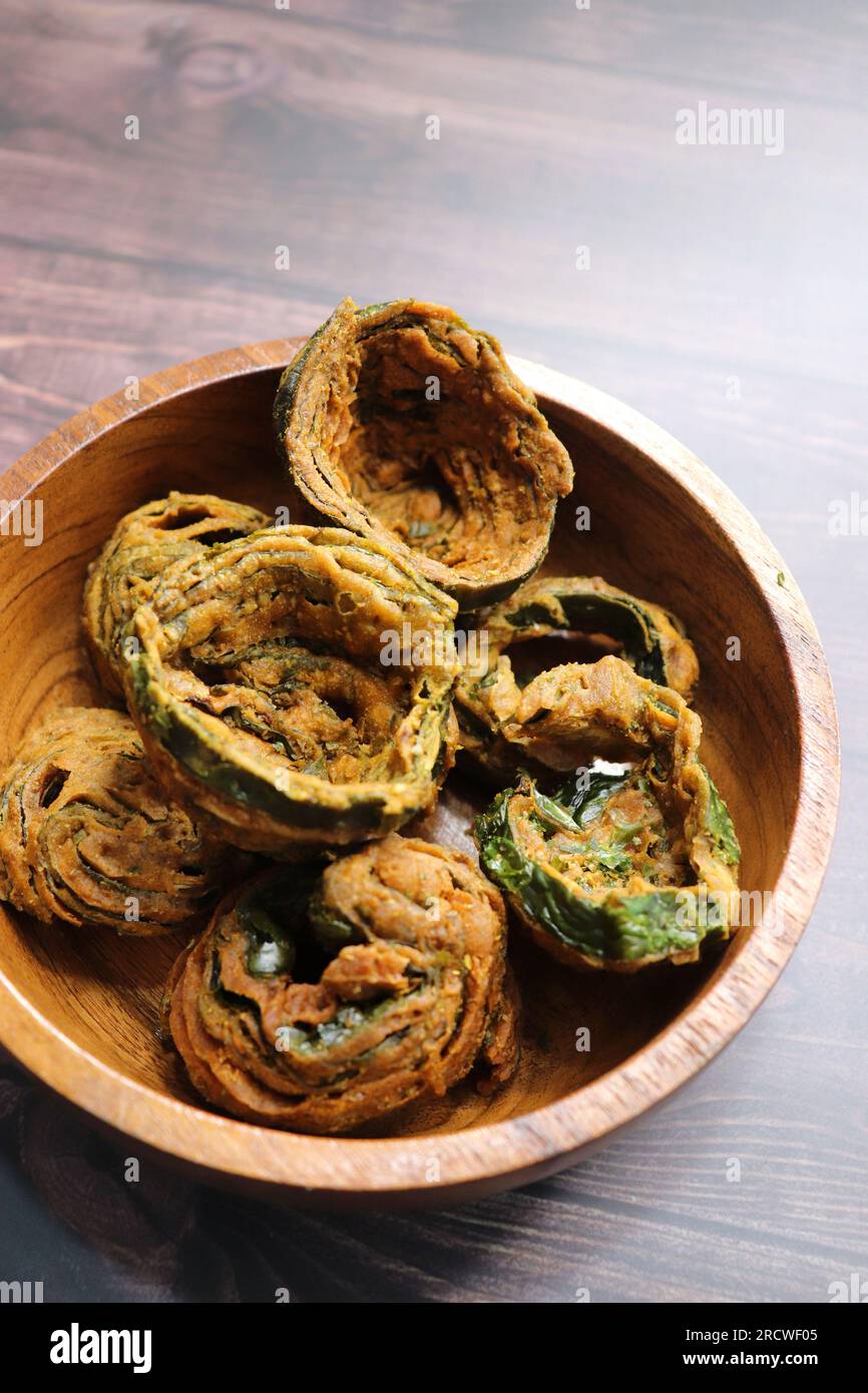 Dry Patra is an Indian dish made with colocasia leaves that are coated ...