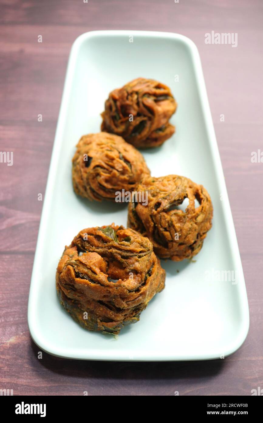 Dry Patra is an Indian dish made with colocasia leaves that are coated ...