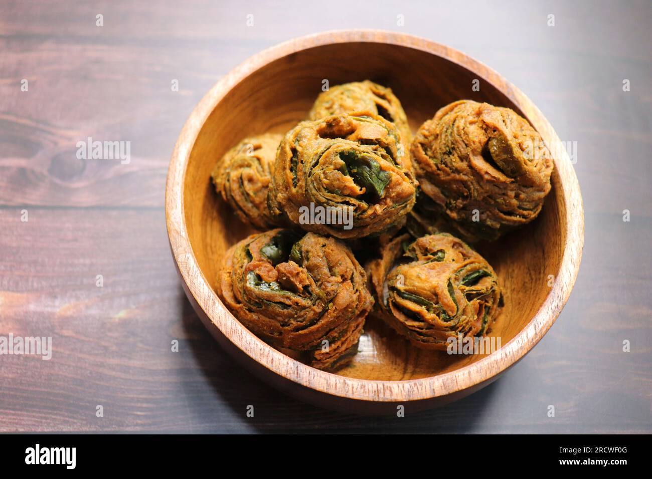 Dry Patra is an Indian dish made with colocasia leaves that are coated ...