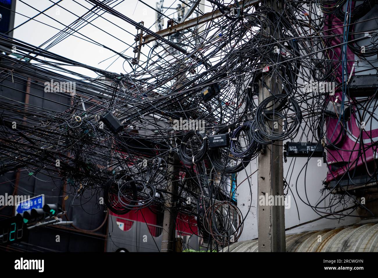 Bangkok, Thailand. 17th July, 2023. Clusters of electric power lines ...