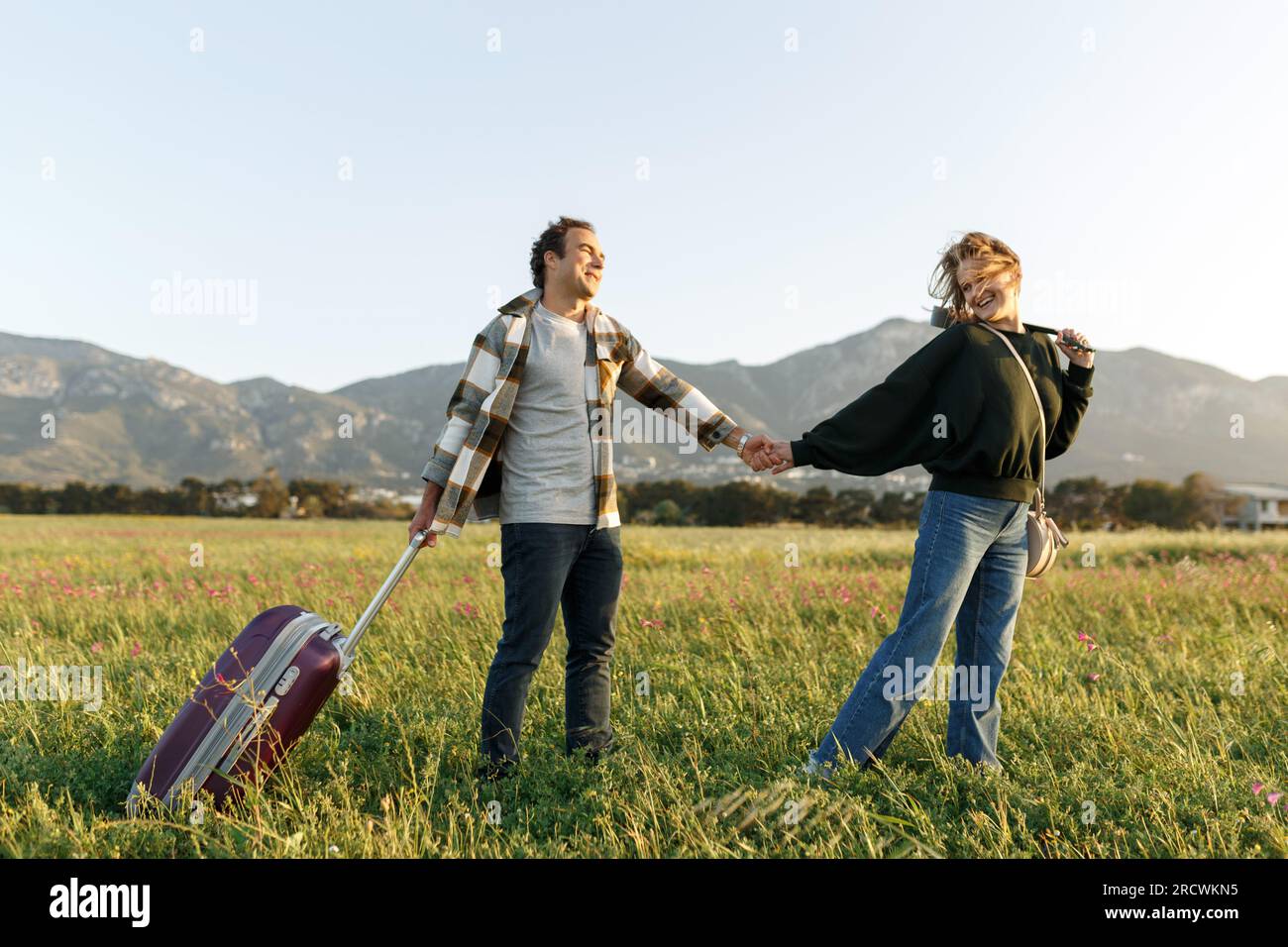 Inspired young loving couple is looking at living plan in future. They ...