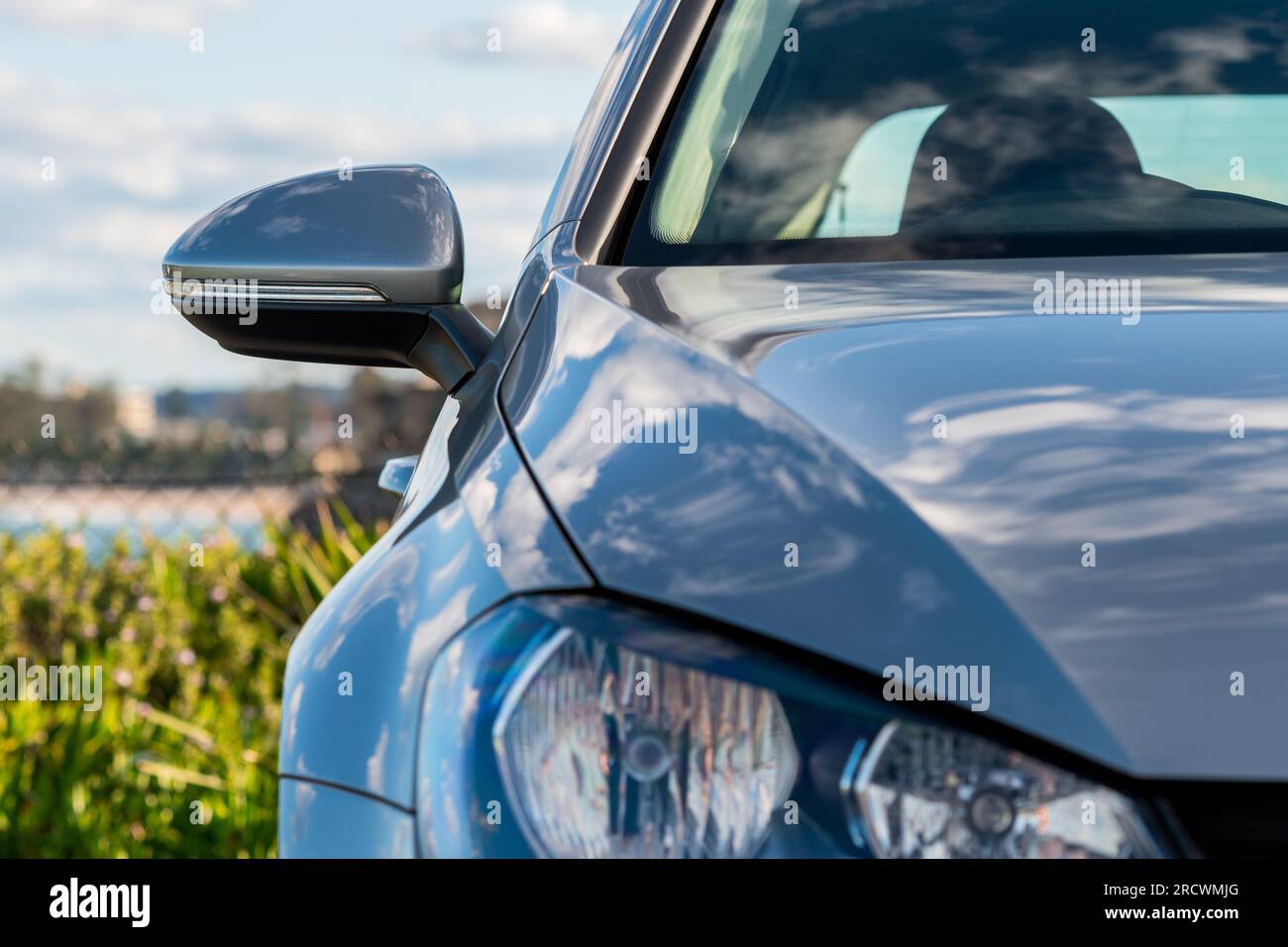 Image of the side view mirror on a modern car. Shallow depth of field ...