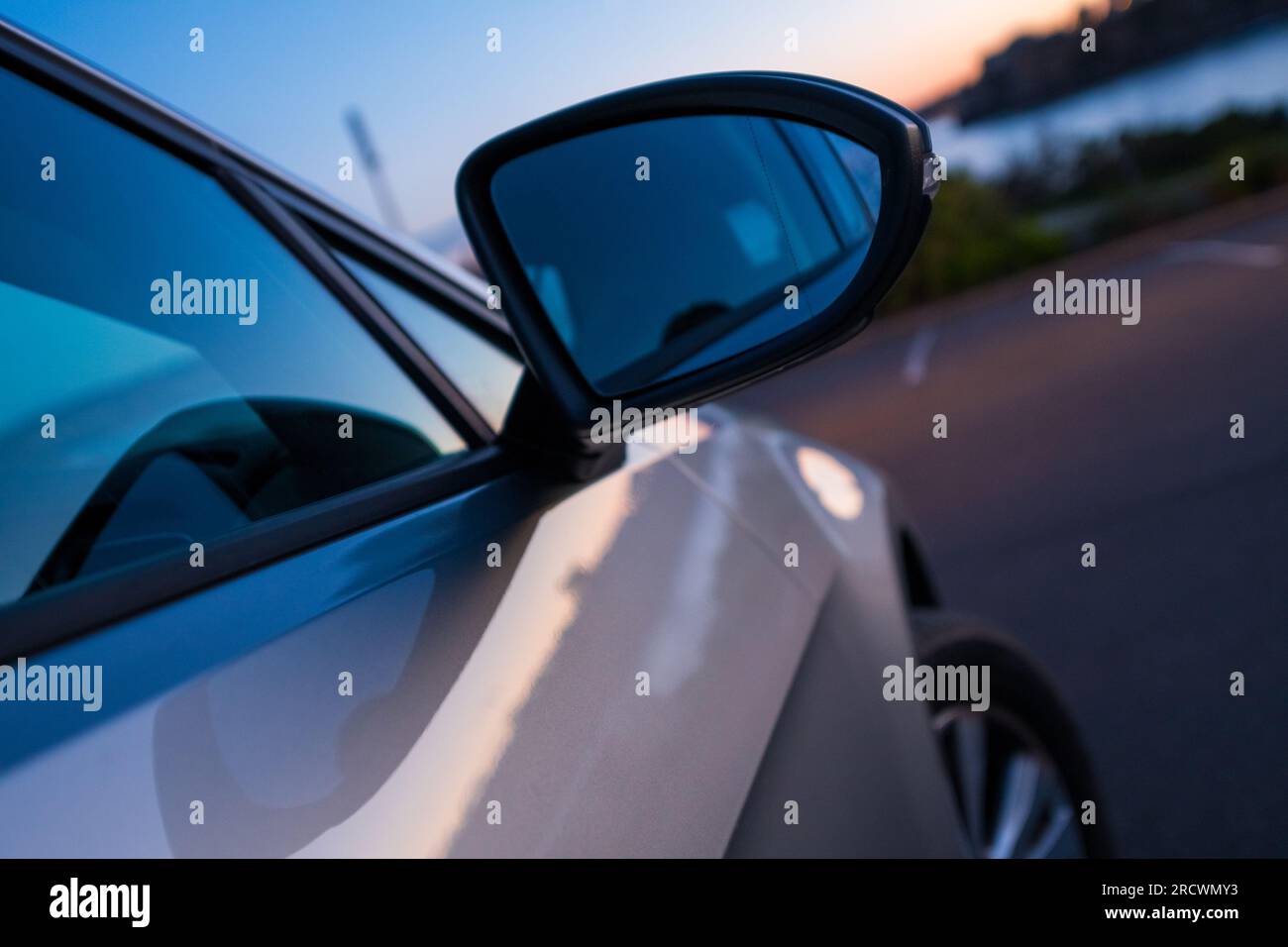 Image of the side view mirror on a modern car. Shallow depth of field ...