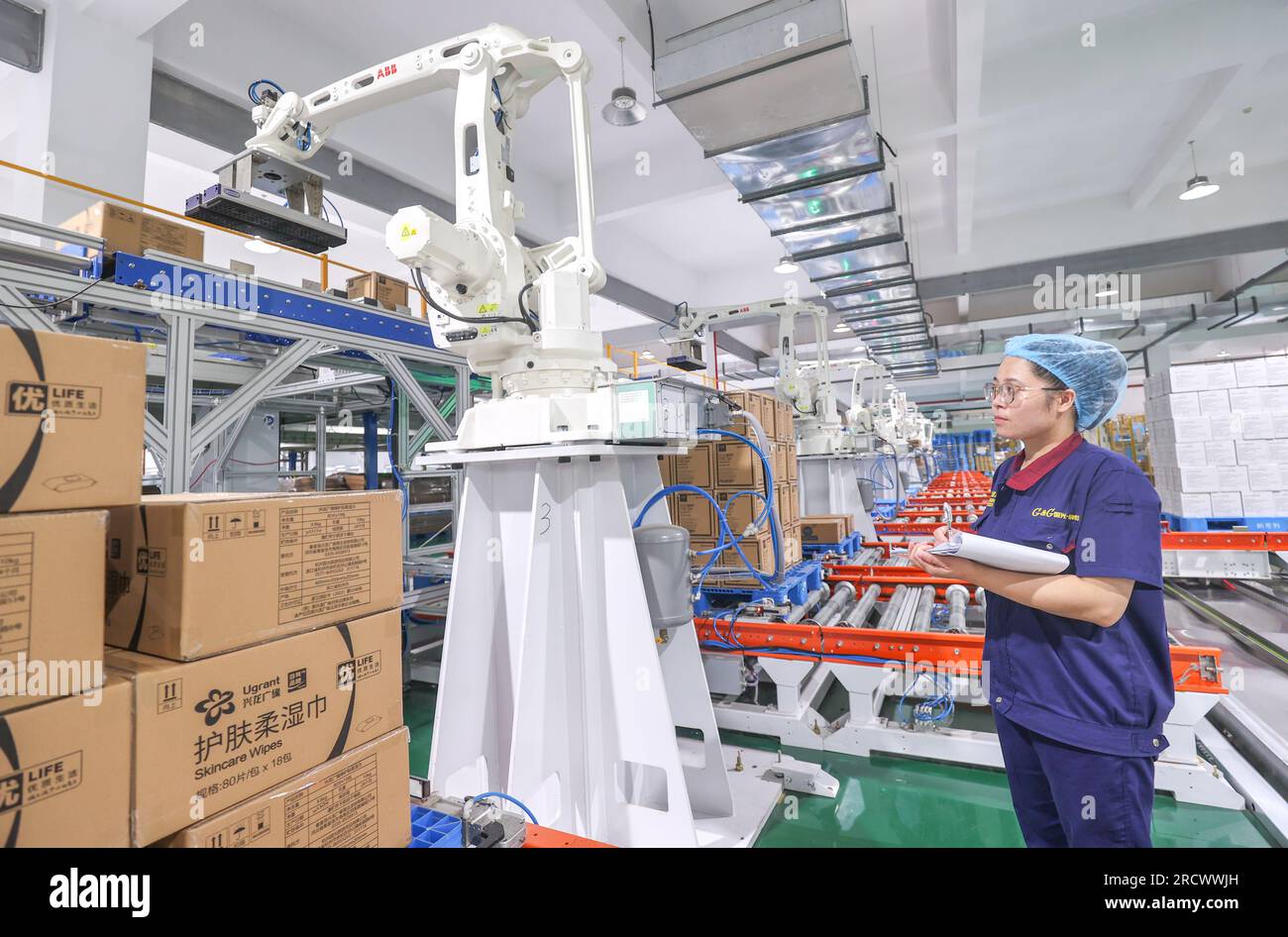 HUZHOU, CHINA - JULY 17, 2023 - Industrial robots work on a wipes ...
