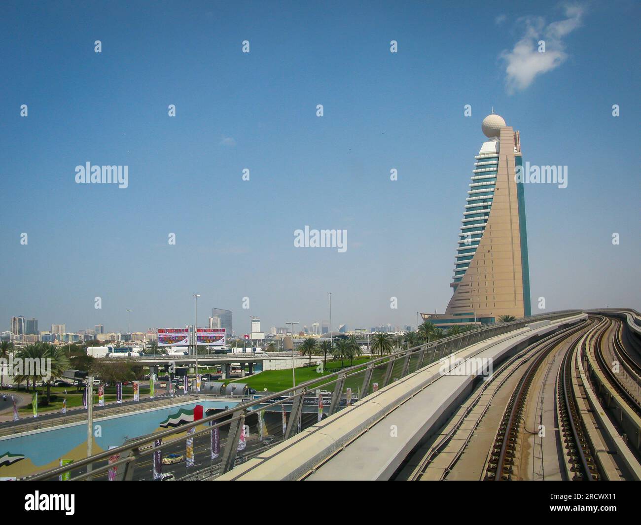 skyscraper and rails of the metro line in Dubai, UAE Stock Photo - Alamy
