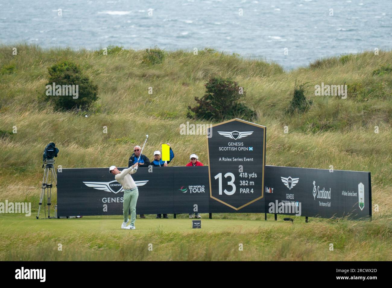 Rory McIlroy plays tee shot at the 13th hole during Genesis Scottish Open 2023 at the ...