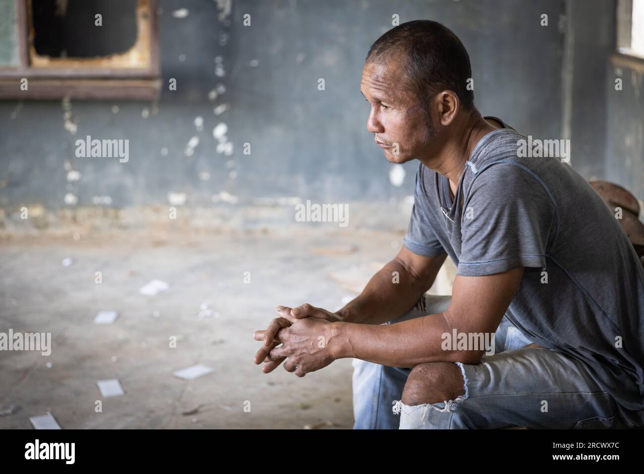 Depressed and hopeless man alone in the dark, Lonely man silhouette ...