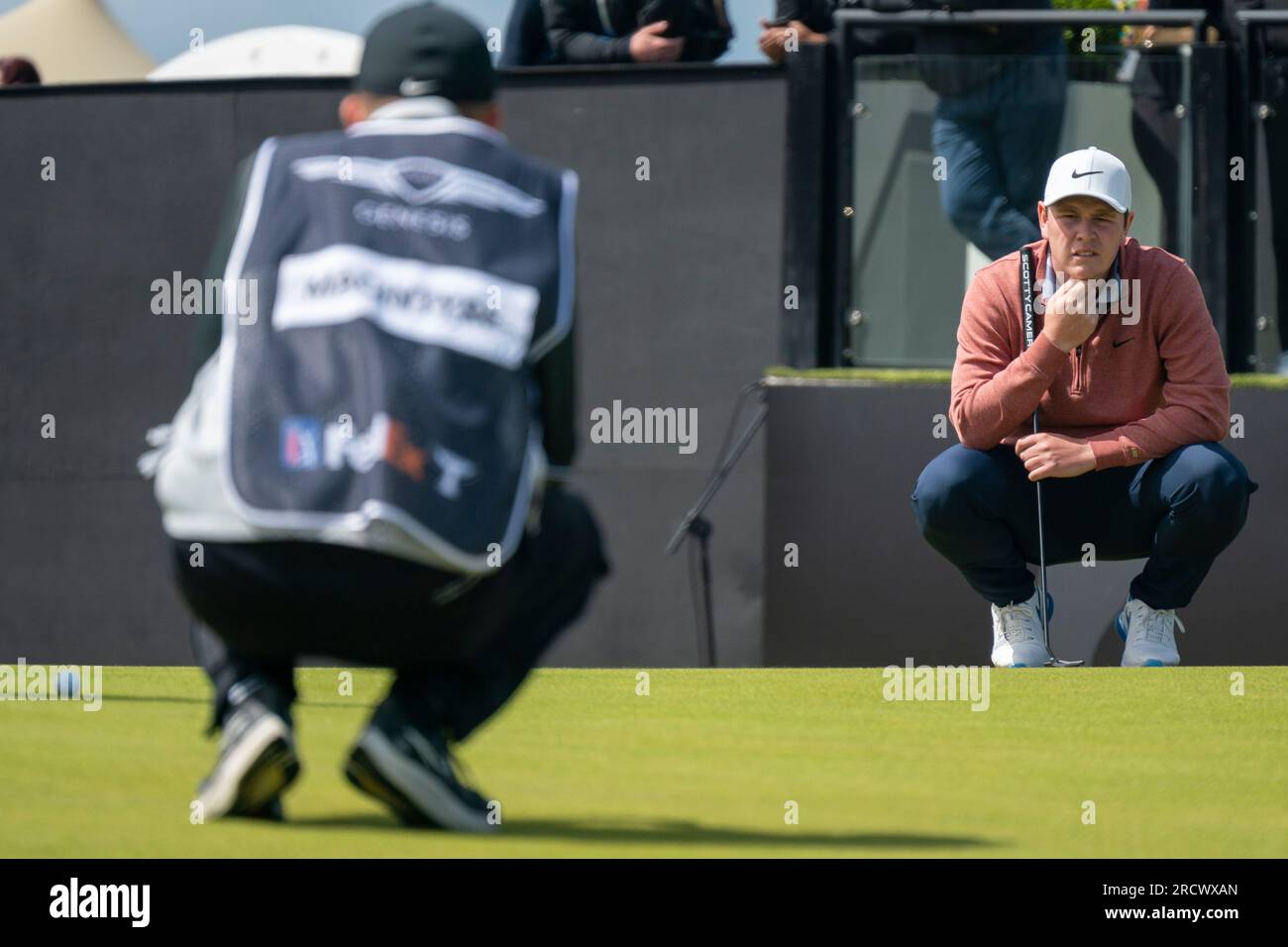 Robert McIntyre lines up put at the 18th green during Genesis Scottish ...