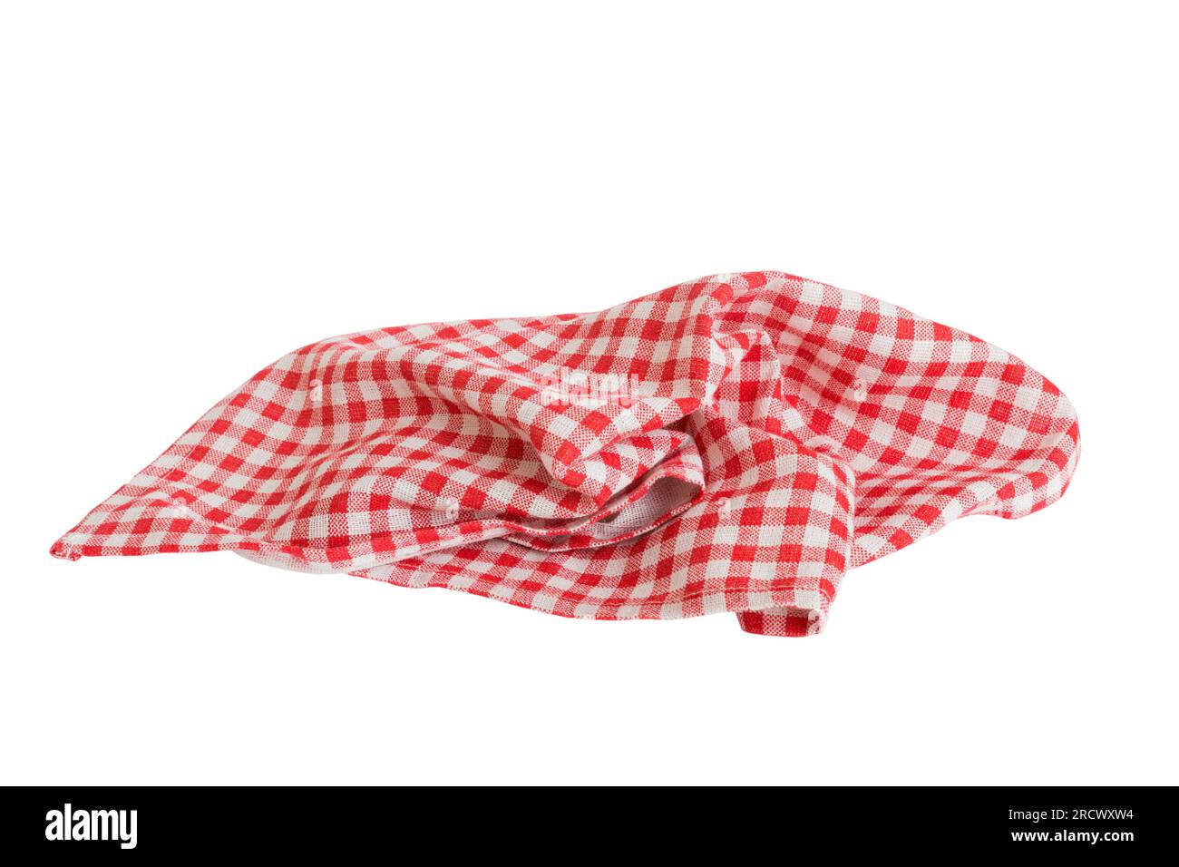 Red textile napkin isolated on white background. Folded decorative ...