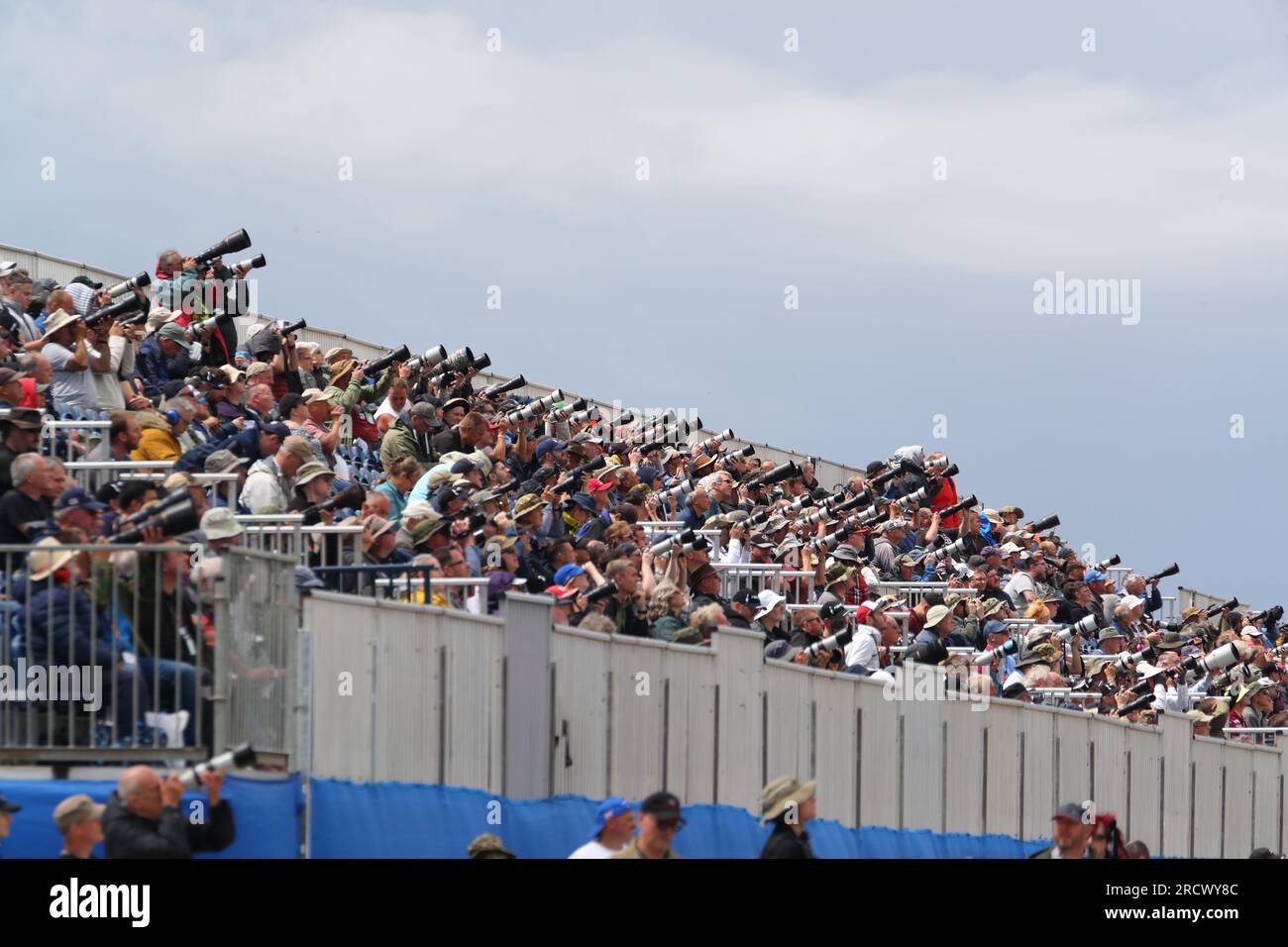 Photographers on the Grandstand all pointing their lenses towards the ...