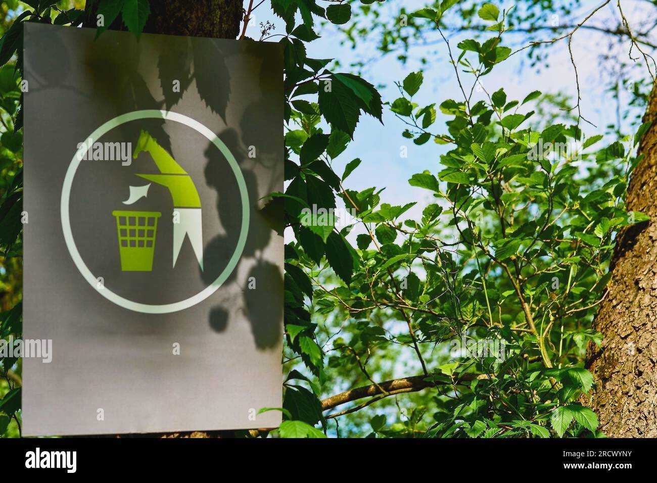 Ecology. Banner about throwing garbage in designated places Stock Photo ...