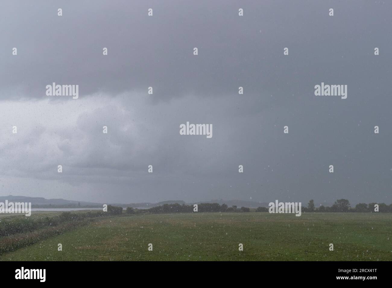 Heavy storm over the Newgrounds at WWT Slimbridge Stock Photo - Alamy