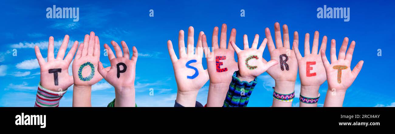 Children Hands Building Colorful English Word Top Secret. Blue Sky As ...