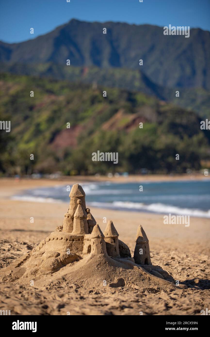 Sand castle on beach with mountain background, Hanalei Bay, Kauai Stock ...