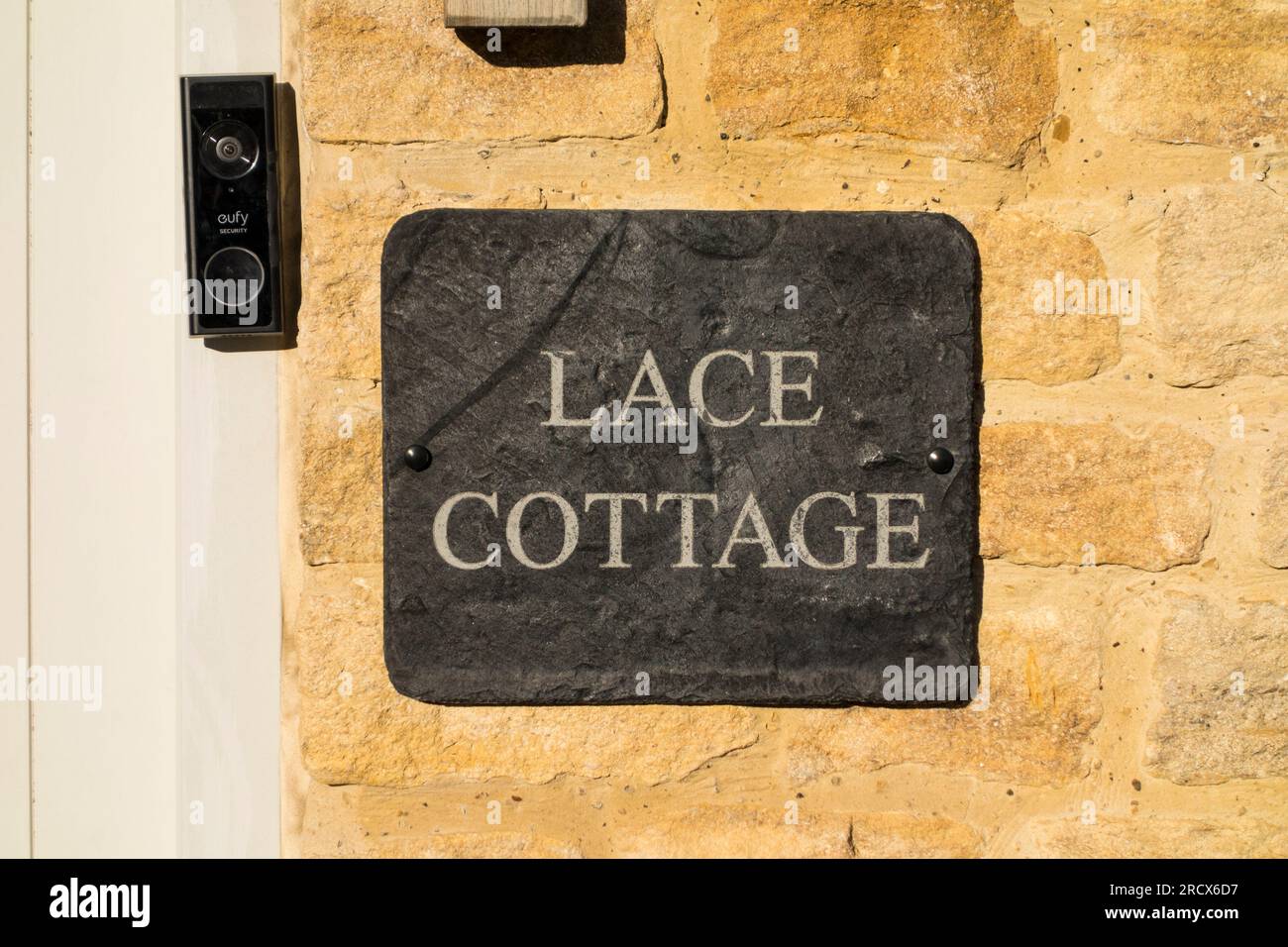 Linen Cottage sign, Gloucestershire, UK Stock Photo - Alamy