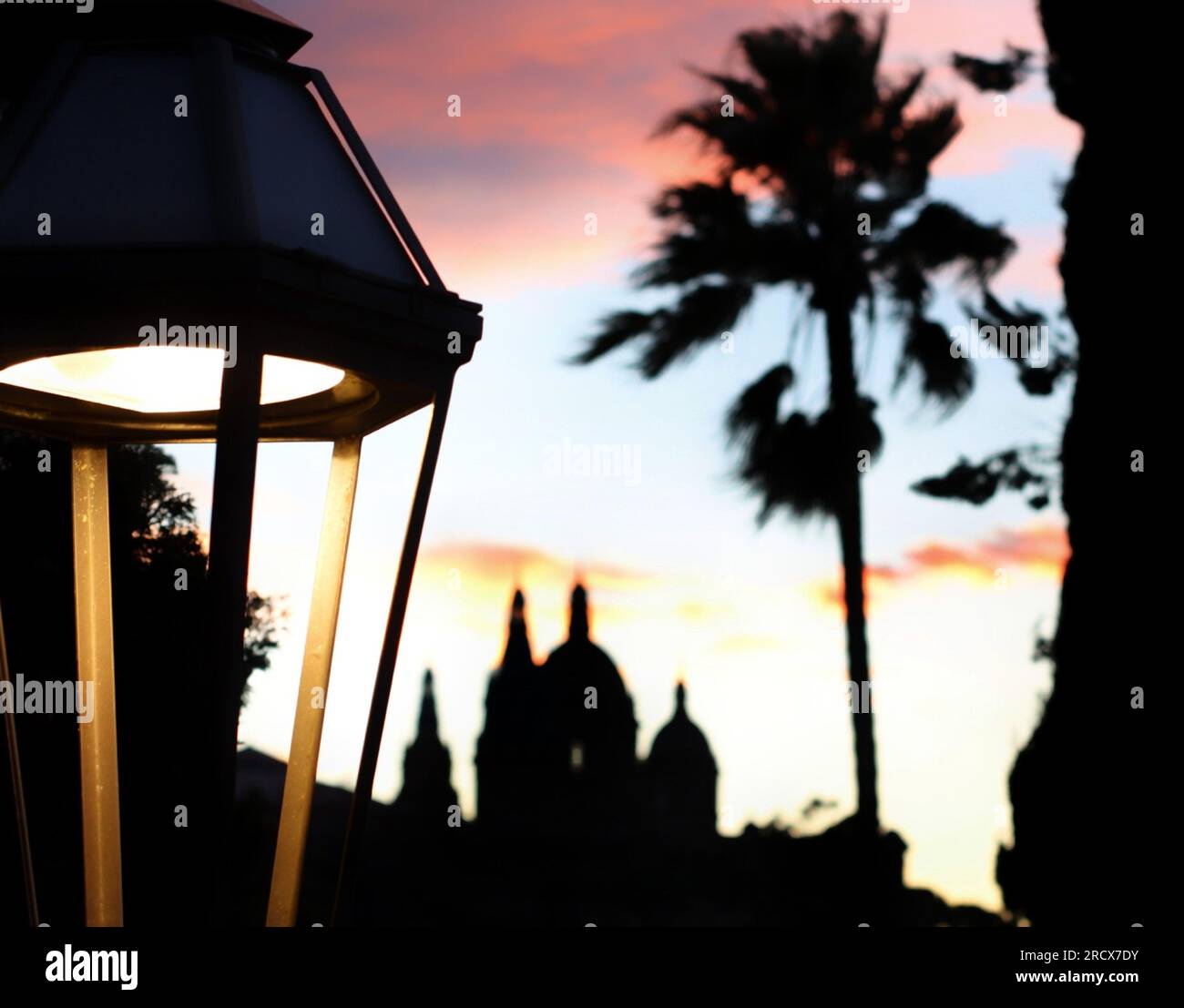Street lamp lit at sunset Stock Photo - Alamy