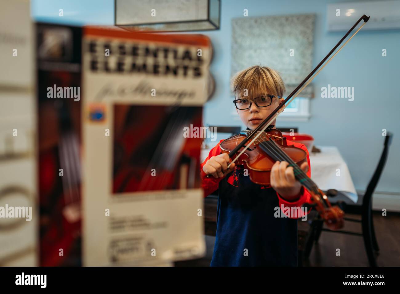 Boy with glasses playing viola hi-res stock photography and images - Alamy