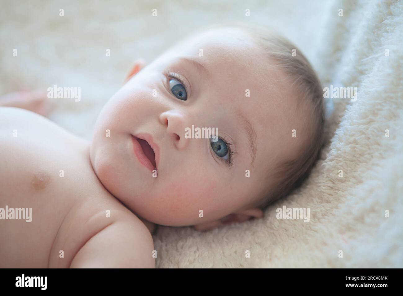 Little baby girl relax at home Stock Photo - Alamy