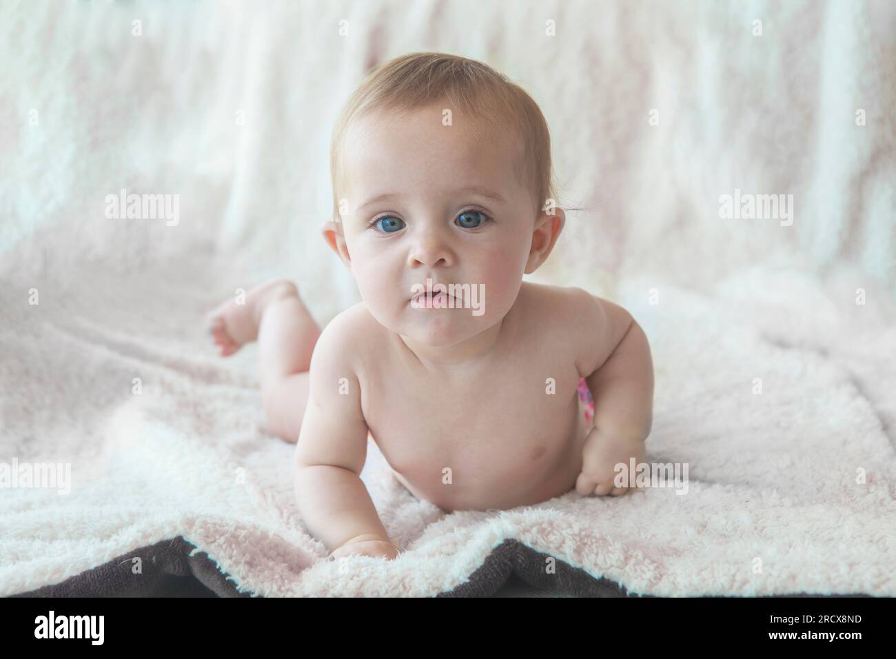 Little baby girl playing at home Stock Photo - Alamy