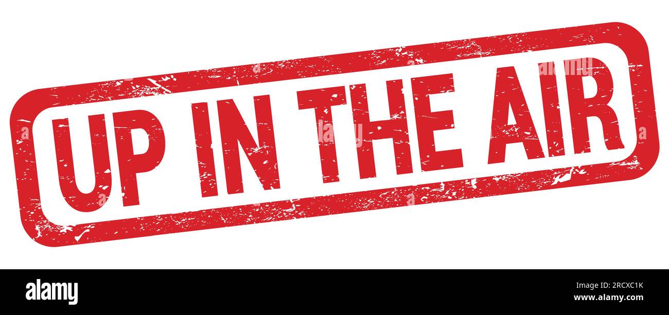 UP IN THE AIR text written on red rectangle stamp sign Stock Photo - Alamy