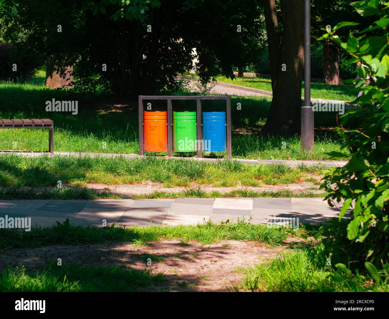 Colorful metal recycle trash bins for paper, glass, plastic, general ...