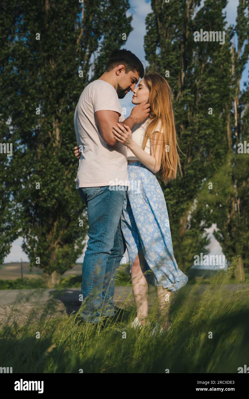 Full length view of two lovers looking with love at each other, they ...