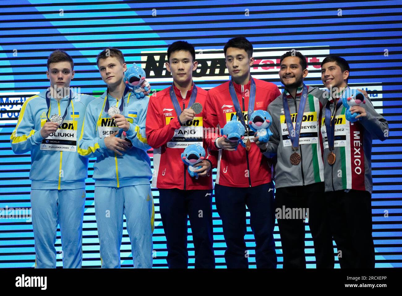 From left to right, silver medalist Oleksii Sereda, Kirill Boliukh, of ...