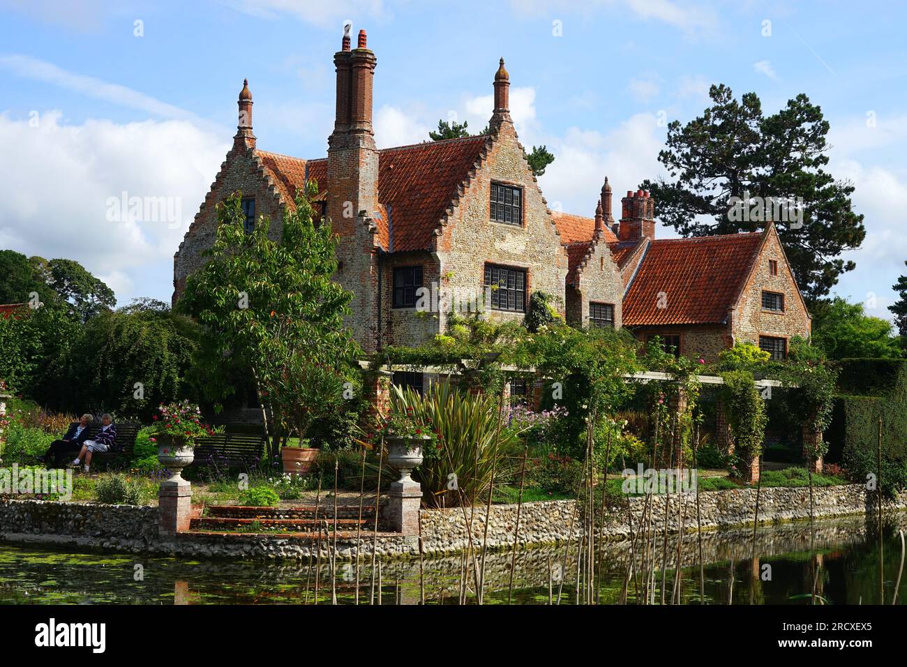 Hindringham Hall - historic moated manor house Stock Photo - Alamy