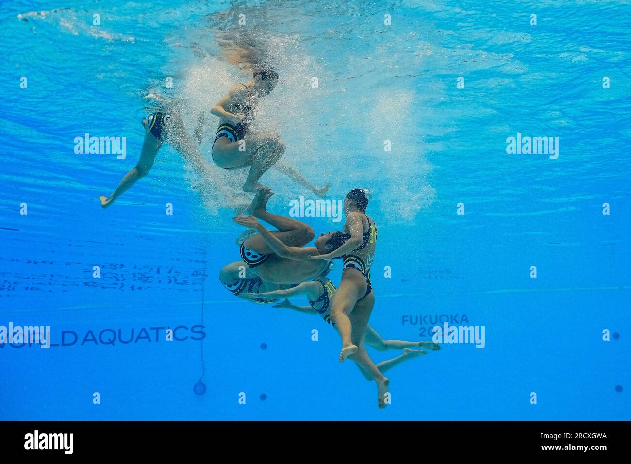 Japan team compete in the team acrobatic final of artistic swimming at ...