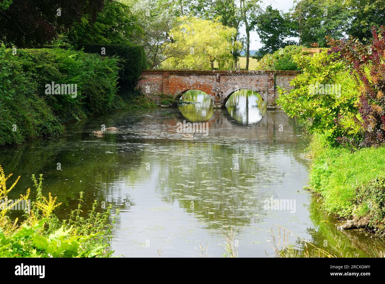 Bridge over the moat at Hindringham Hall Stock Photo - Alamy