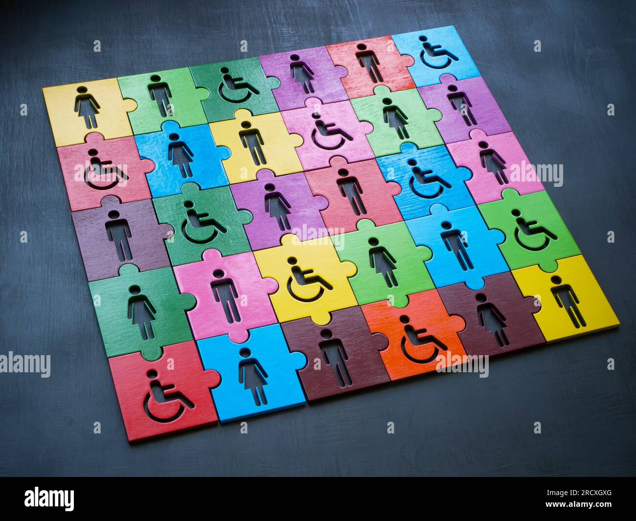 Multi-colored puzzle with figures as a symbol of diversity and ...