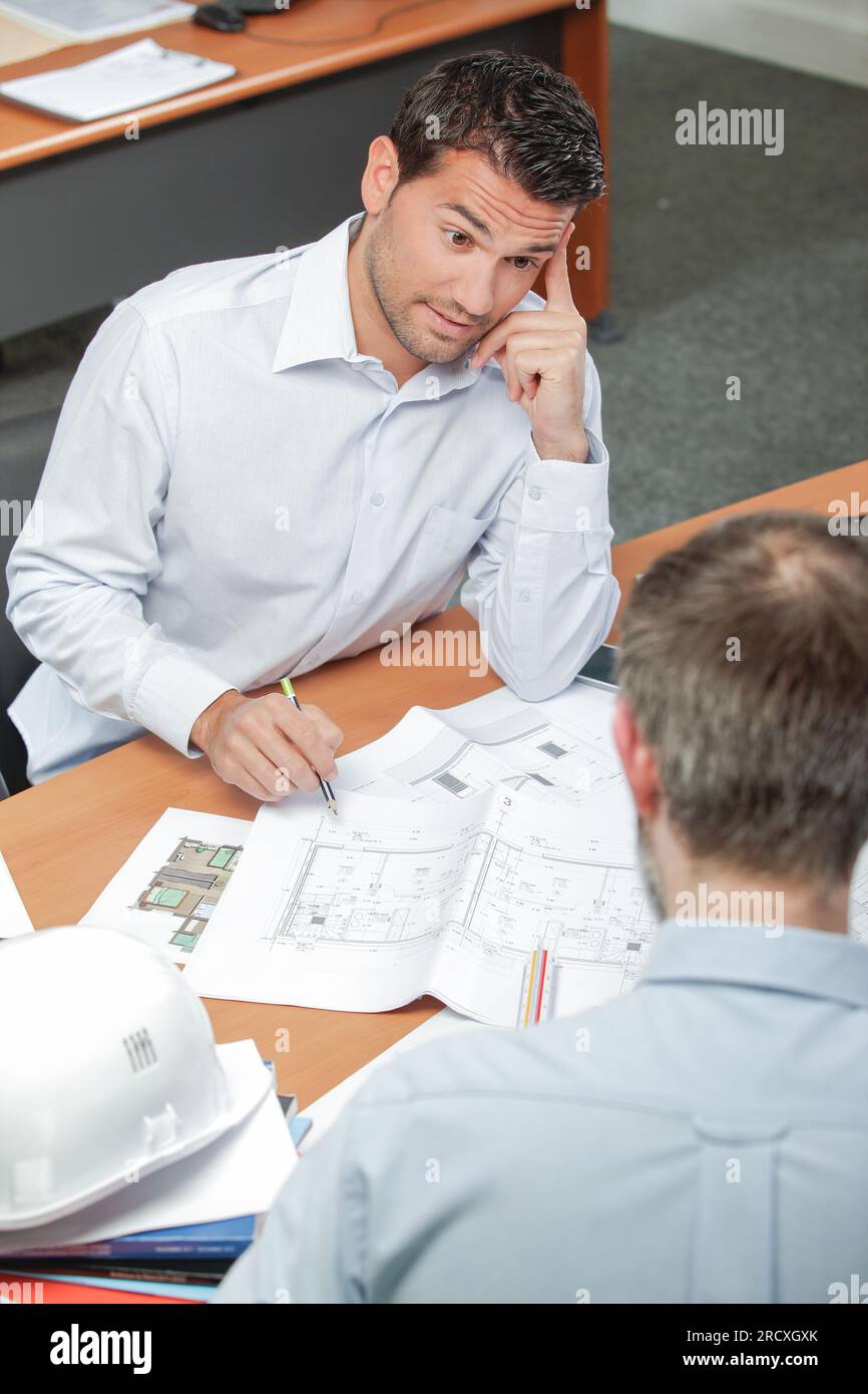 stressed architects in the office Stock Photo - Alamy
