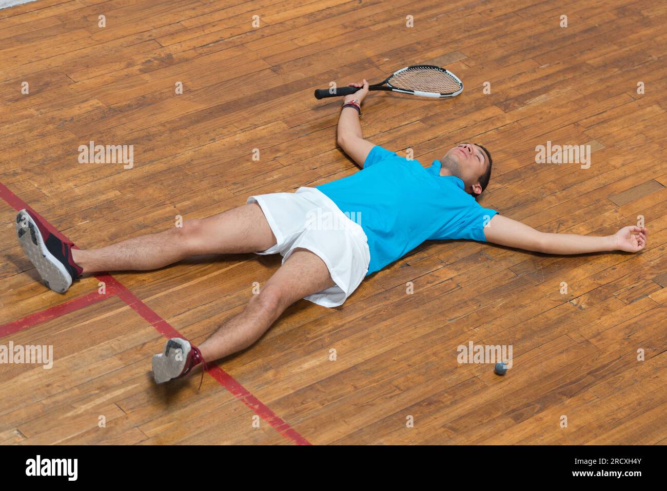a man collapses while playing Stock Photo - Alamy